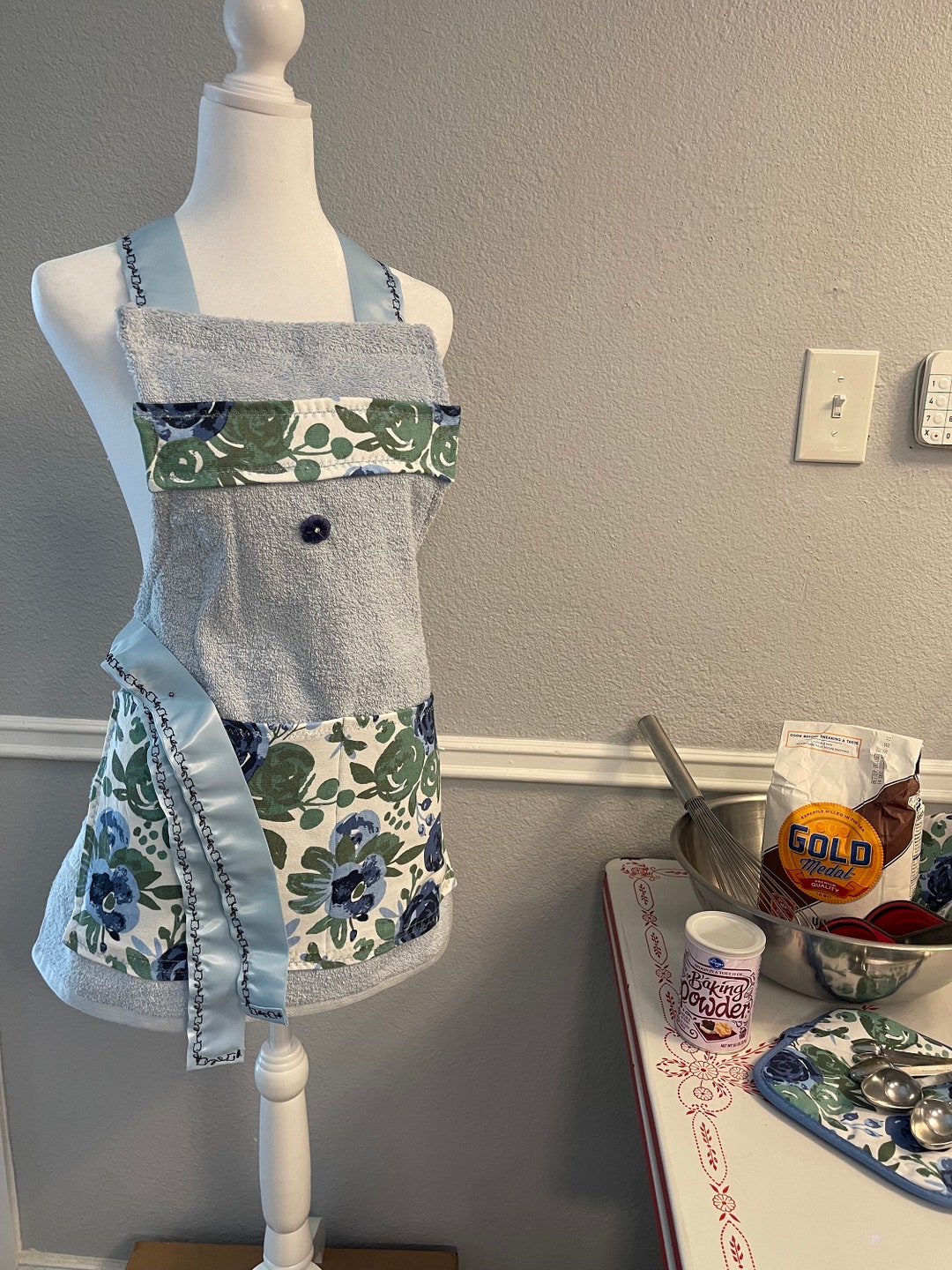 Are You Blue Right Now Brighten up With This Light Blue Apron Adorned ...