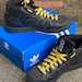 Vintage Adidas Shell Toe Mid-tops, Black Adidas Sneakers, Yellow Laces ...