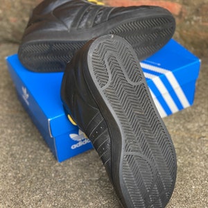 Vintage Adidas Shell Toe Mid-tops, Black Adidas Sneakers, Yellow Laces ...