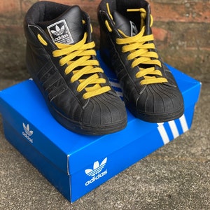 Vintage Adidas Shell Toe Mid-tops, Black Adidas Sneakers, Yellow Laces ...