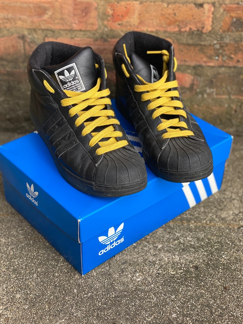 Vintage Adidas Shell Toe Mid-tops, Black Adidas Sneakers, Yellow Laces ...
