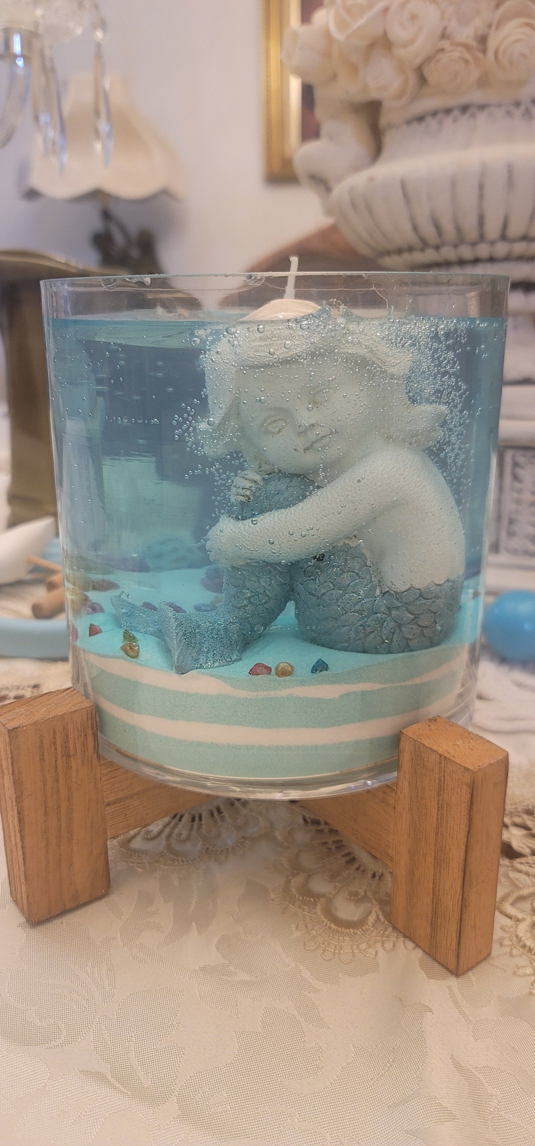 Teal Gel Candle With Mermaid Inside in Large Glass Vase on Wooden ...