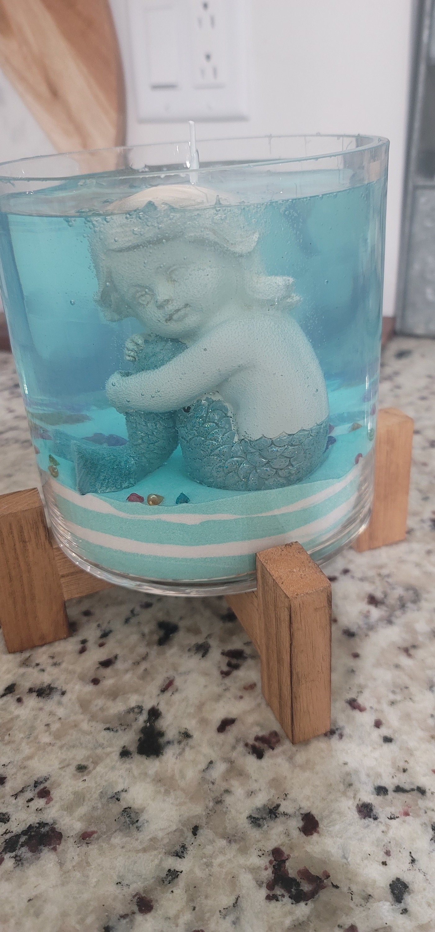 Teal Gel Candle With Mermaid Inside in Large Glass Vase on Wooden ...