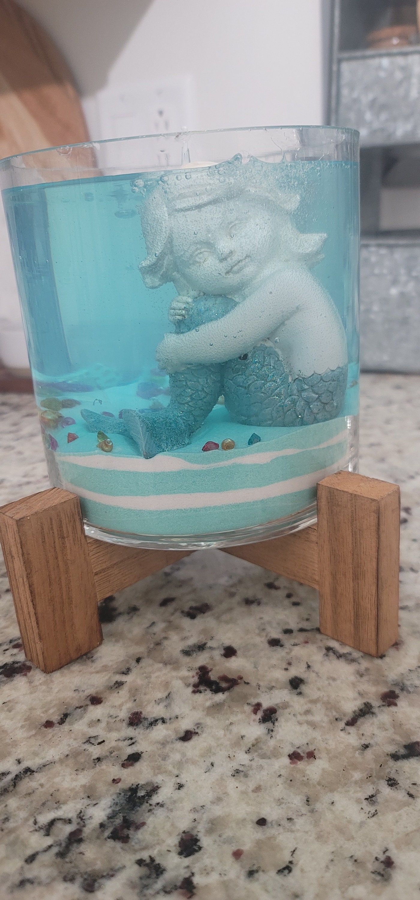 Teal Gel Candle With Mermaid Inside in Large Glass Vase on Wooden ...
