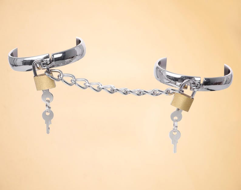 Metal Handcuffs and Leg Cuffs on a Chain With Locks, Restraints Set ...