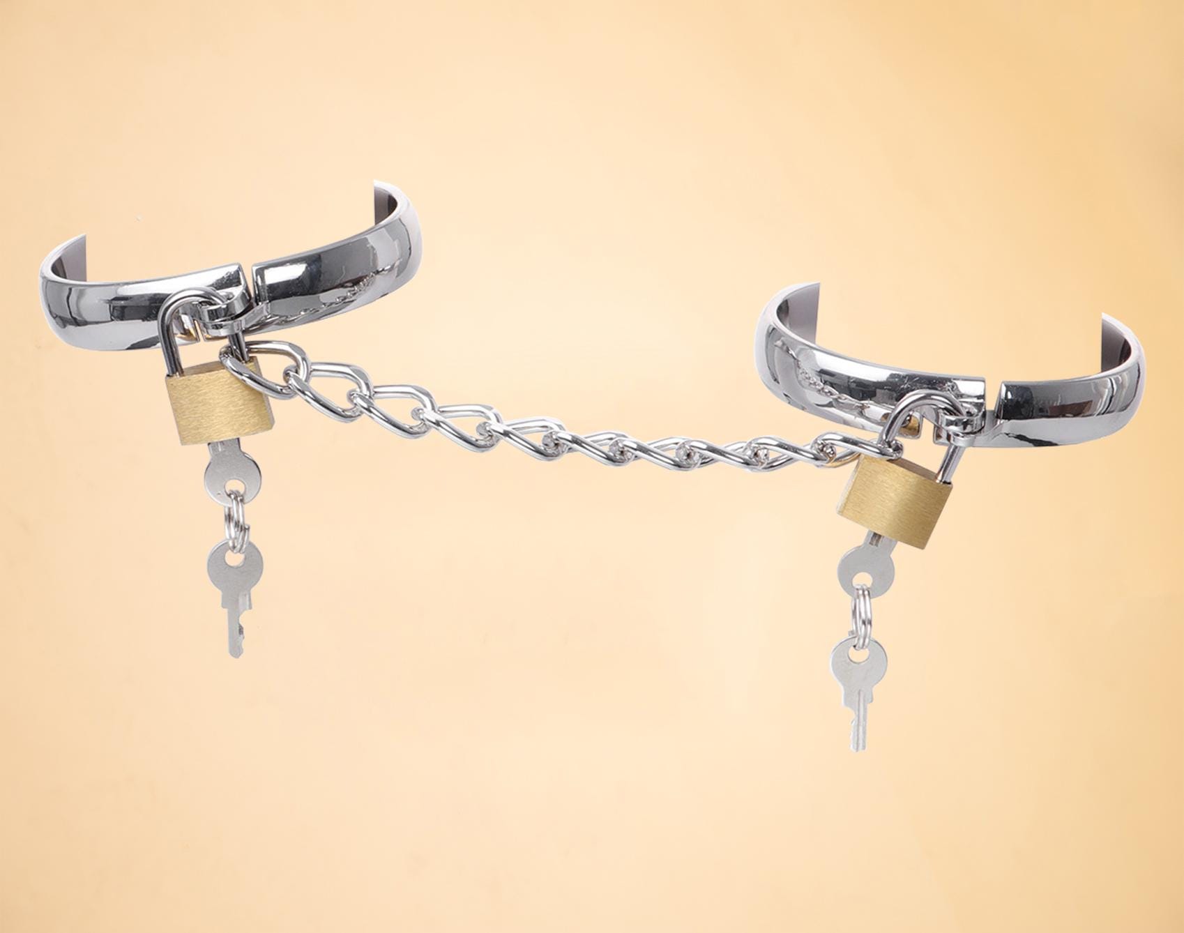 Metal Handcuffs and Leg Cuffs on a Chain With Locks, Restraints Set ...