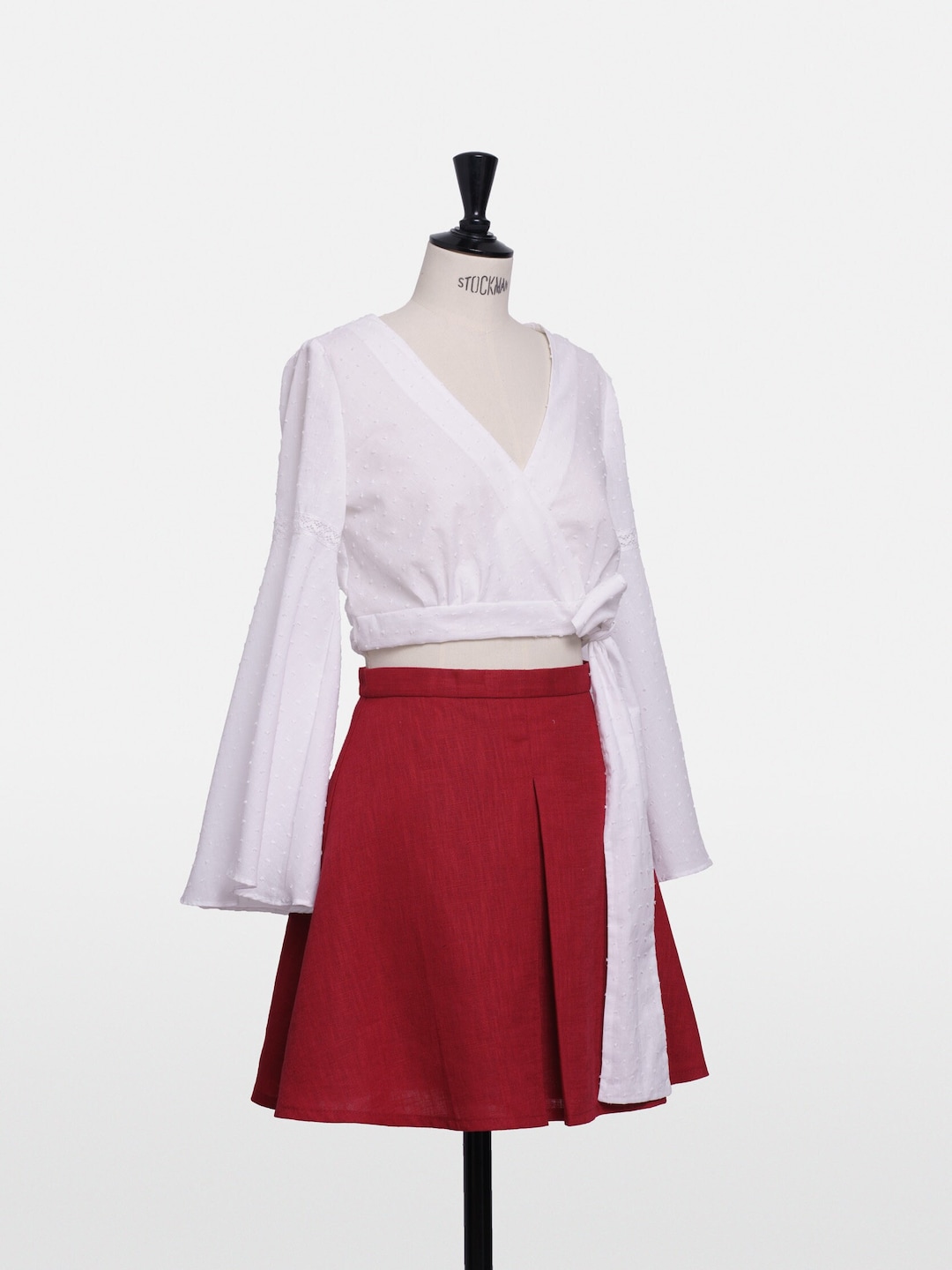 White Wrap Blouse With Sheer Sleeves and Textured Detail for Chic ...