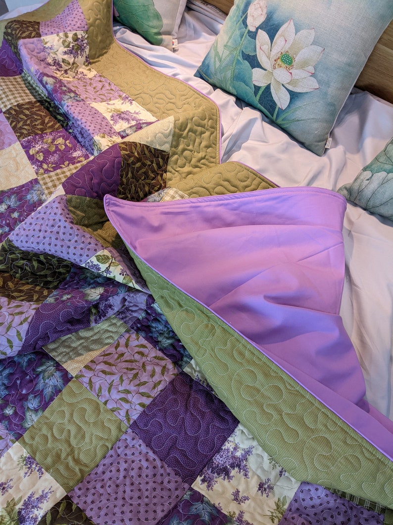 Violet Garden Quilt, Handmade Quilted Blanket Features Vibrant Violet Flowers on a Patchwork ...