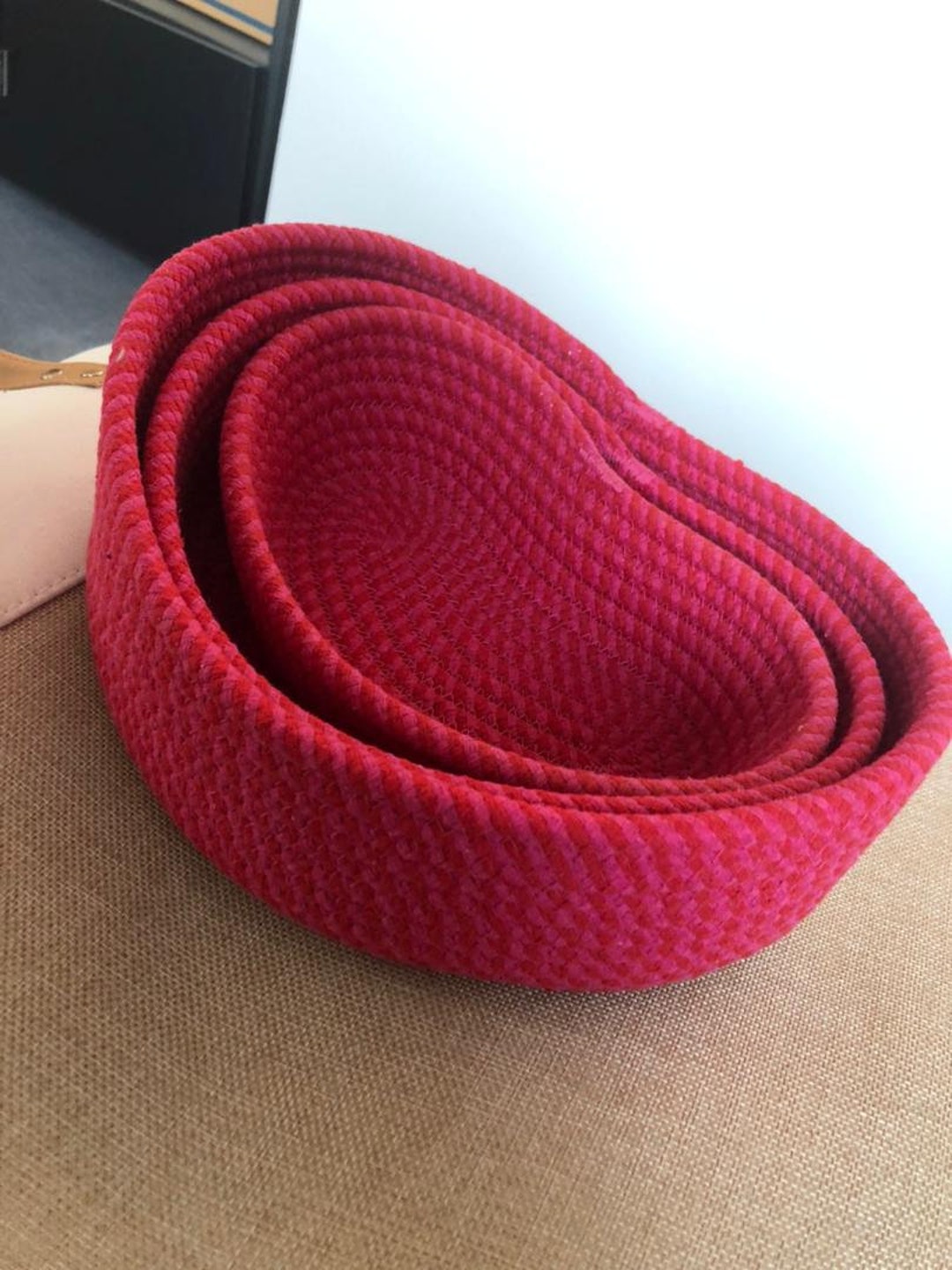 Three Pink Woven Baskets With Red Fabric Accents Three Pink Fabric ...