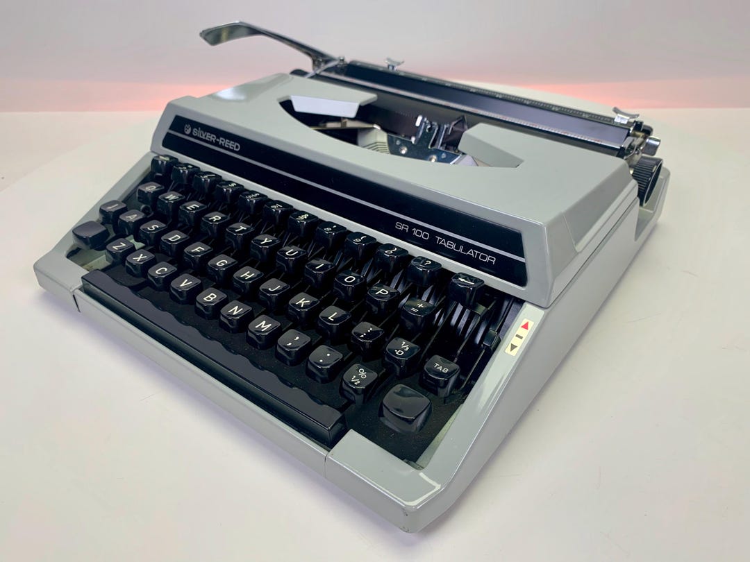 Silver Reed SR-100 Portable Vintage Typewriter – Made in Japan – Four ...