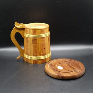 Vintage Large Segmented Wooden Beer Mug on a Wooden Coasters. Beautiful ...