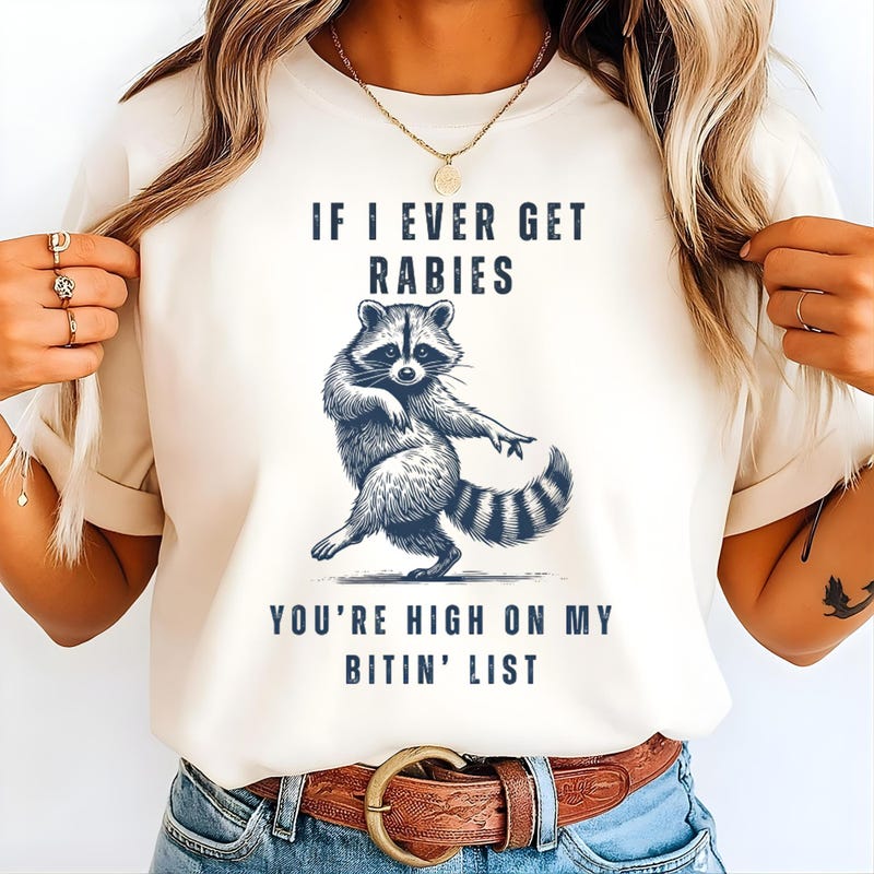 Raccoon Biting List Shirt - Etsy