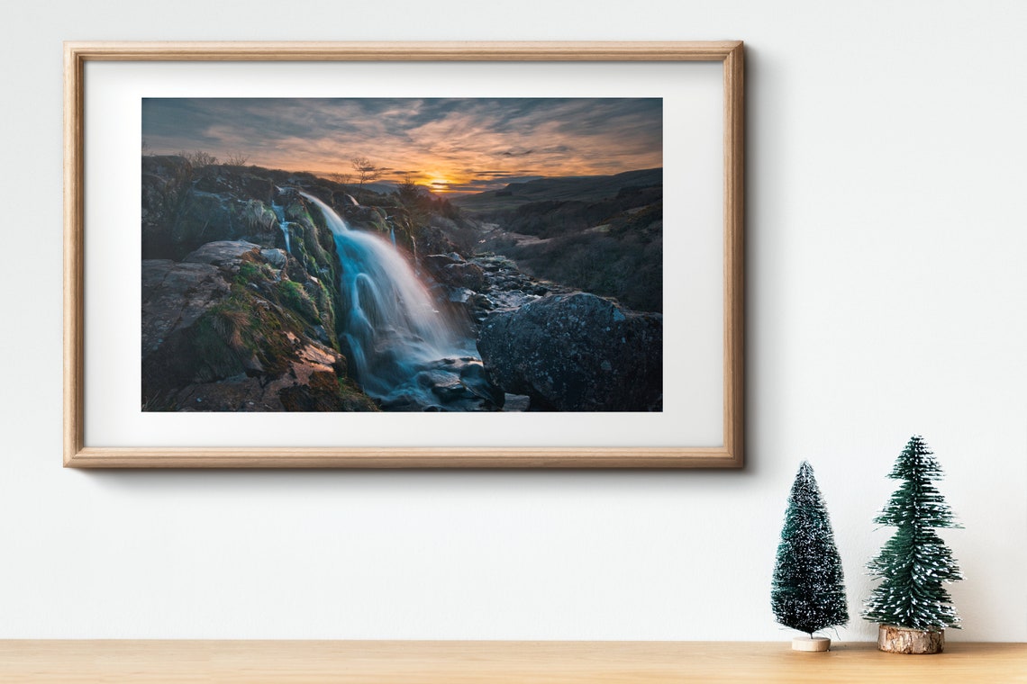 Mini Waterfall in a Country Setting With Sunset and Cloudy Skies ...