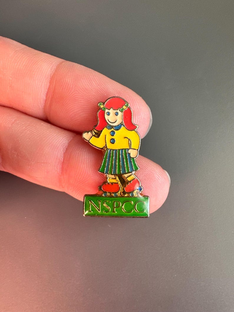 Waving Young Girl NSPCC Charity Cartoon Character Child Enamel Lapel ...