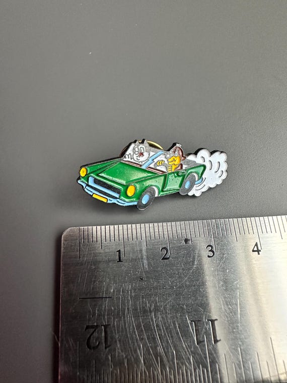 1991 Pif & Hercule driving car comic strip characters… - Gem