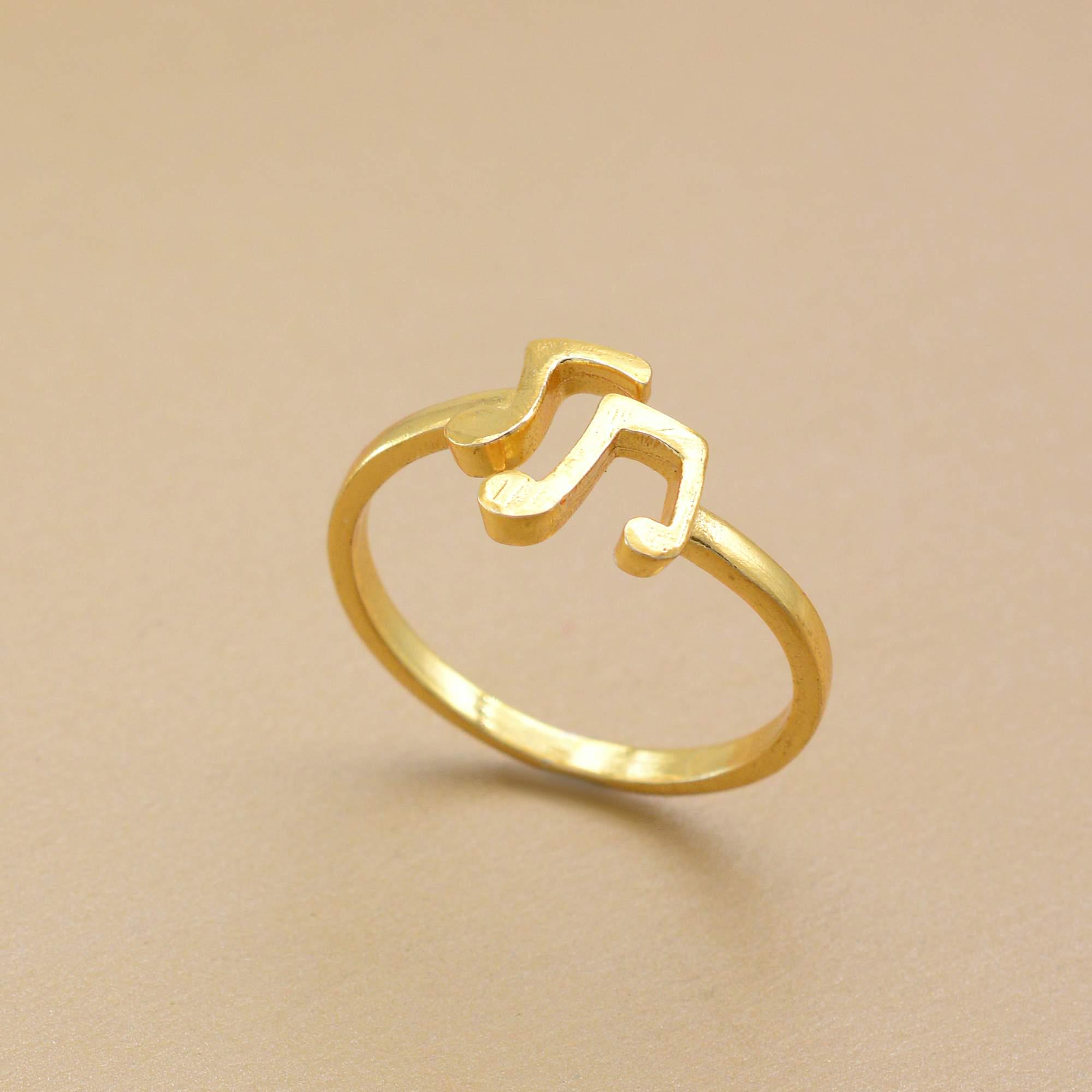 Delicate Gold Tone Ring Featuring a Minimalist Open Design of Two ...