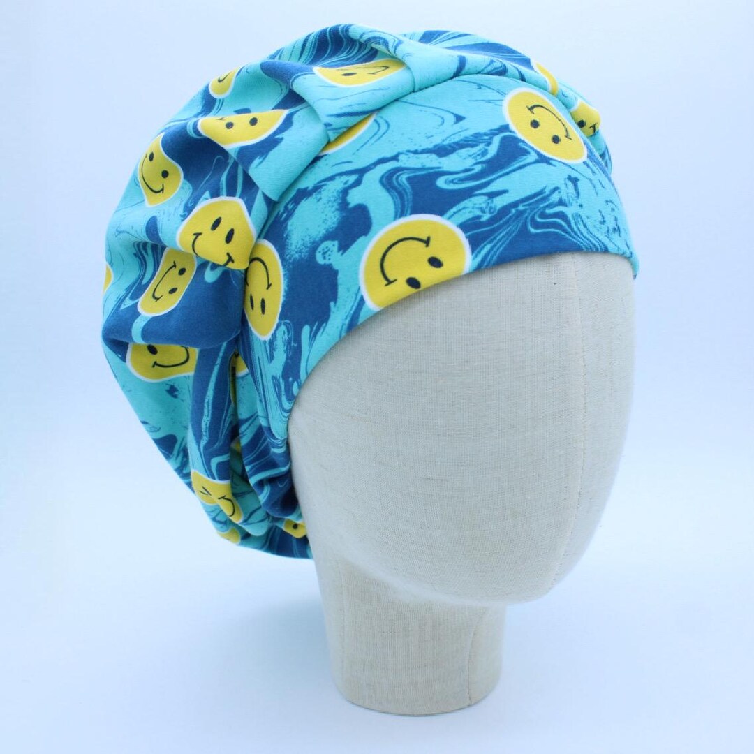 Smiley Happy Faces on Marbled Blue and Teal Pattern in A Bouffant-style ...