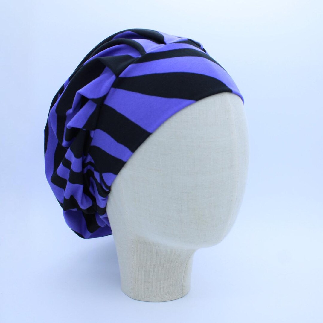 Black and Purple Swirl Pattern on Double Brushed Poly in a Bouffant ...