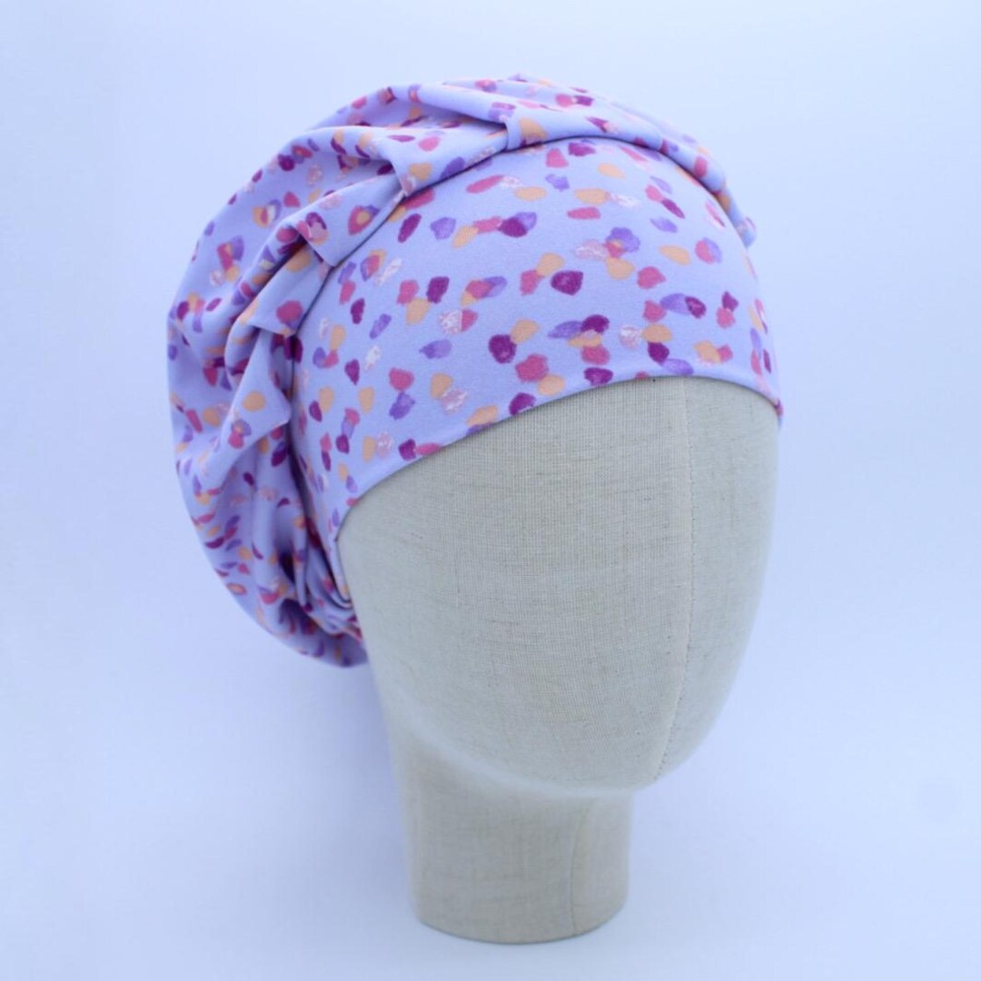 Purple and Pink Confetti on Lavender Double Brushed Poly Fabric in a ...