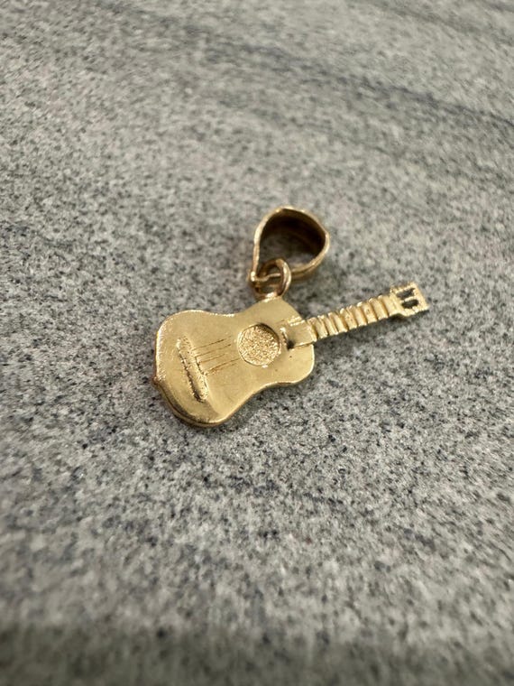 Vintage 10K solid gold swinging guitar - Gem