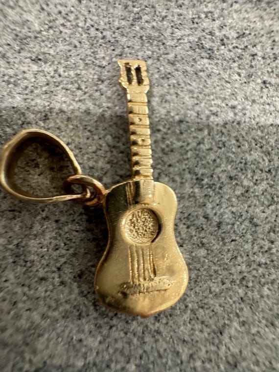 Vintage 10K solid gold swinging guitar - Gem