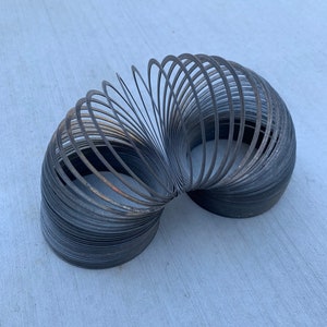 Vintage 90s Slinky Desk Toy Metal - Etsy