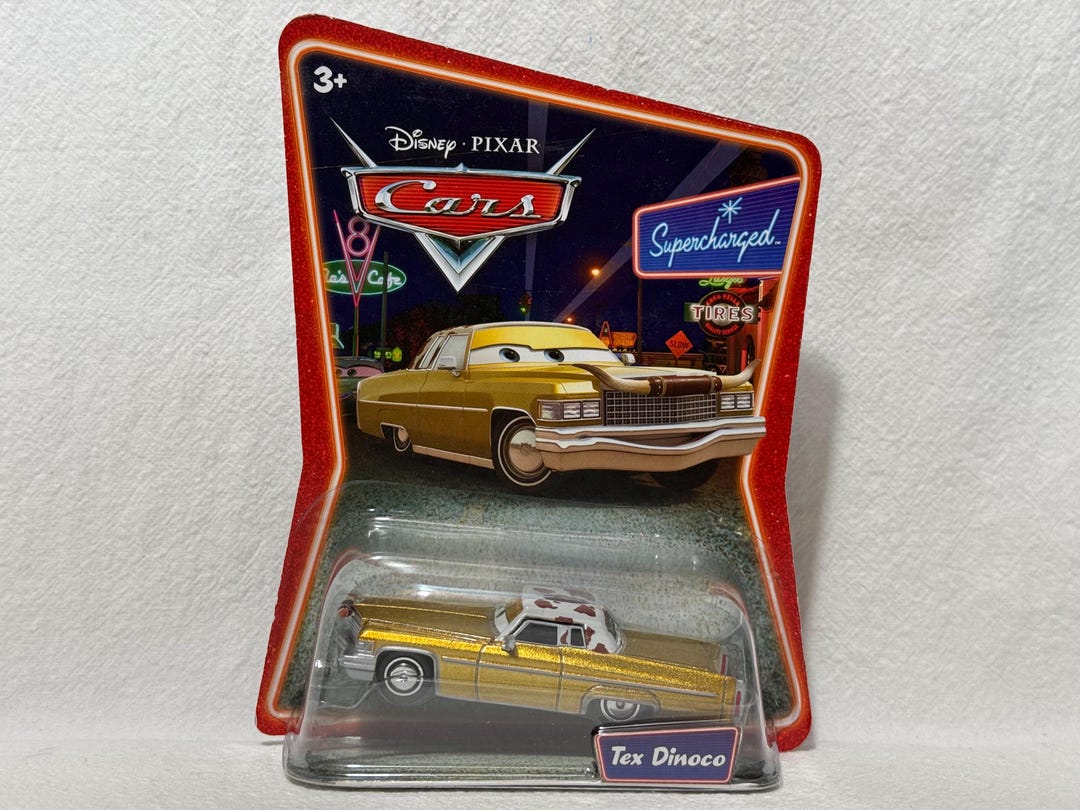 Disney Pixar Cars Tex Dinoco Gold 1975 Cadillac Coupe De Ville, New in ...