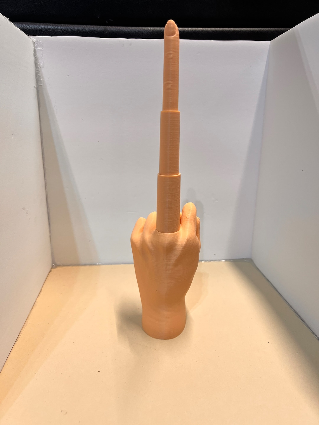Collapsing Middle Finger Sculpture With Retractable Middle Finger ...