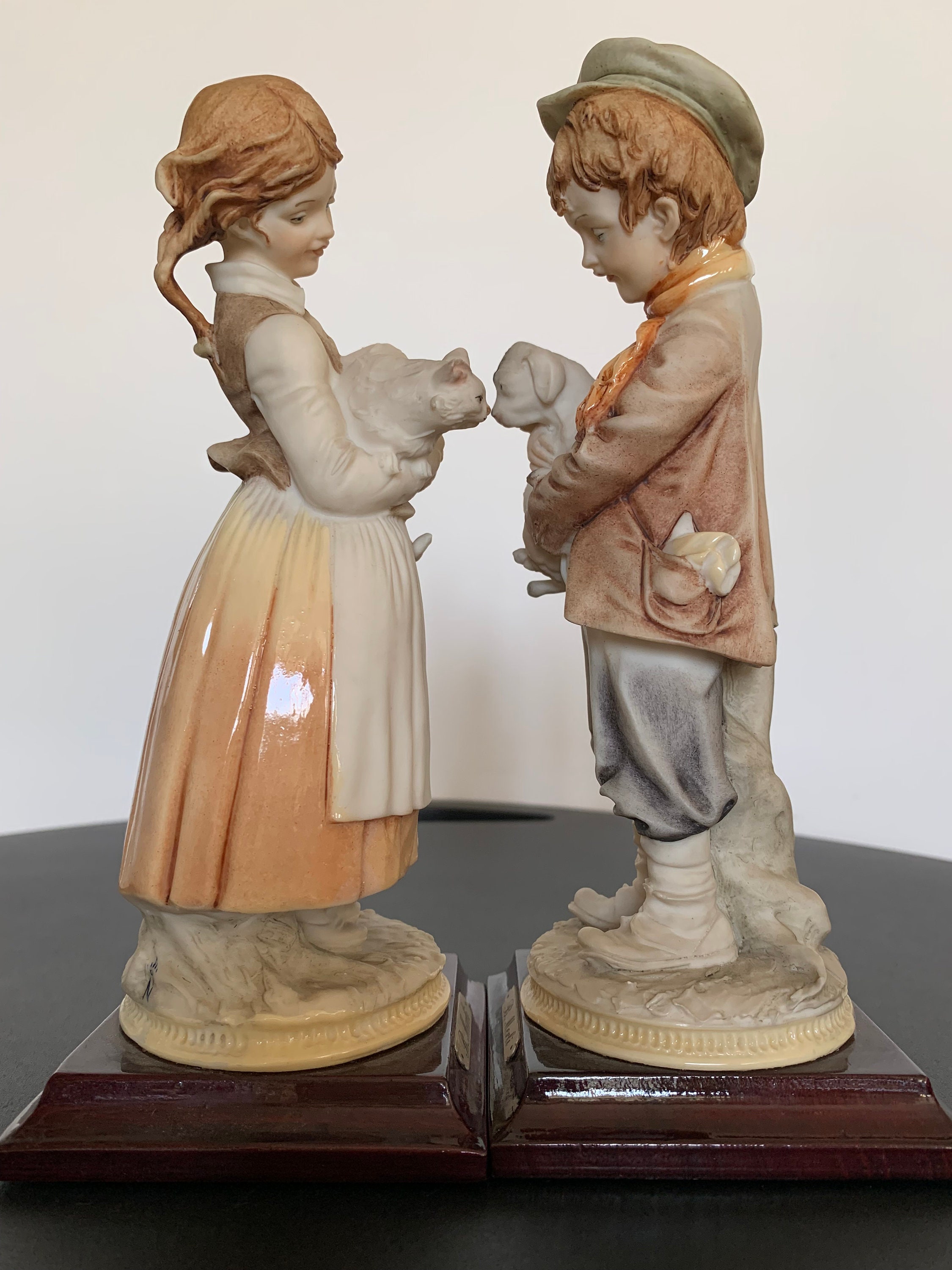 Vintage Bruno Merli Capodimonte Figurines: Boy Holding a Dog and Girl ...