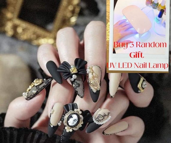 Acrylic Nails With Painted Bows