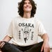 Japan Osaka Glico Running Man Raccoon Shirt, Harajuku Japanese ...