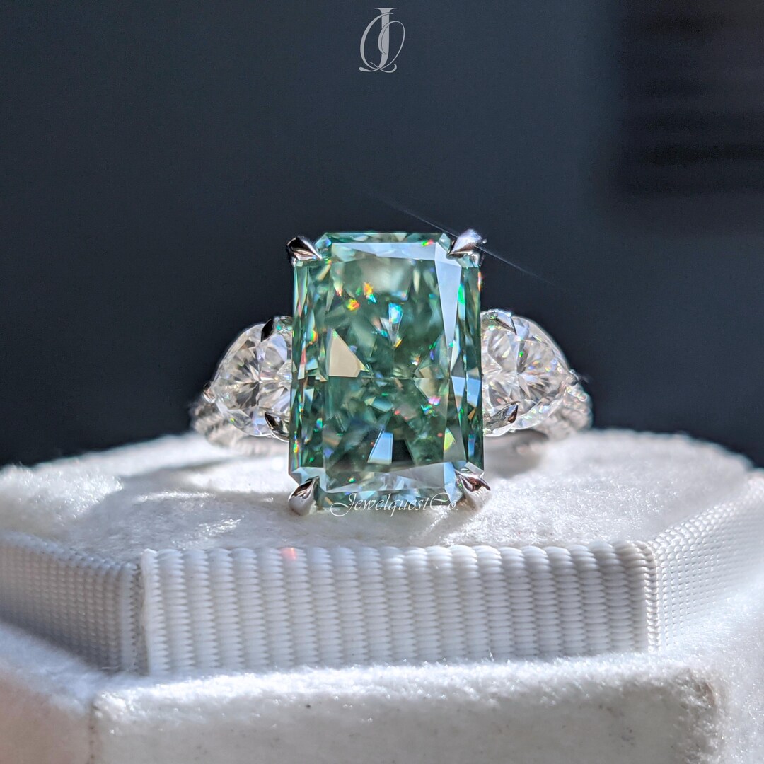Cyan Blue Radiant Moissanite Three Stone Ring, Heart Side Stone Art ...