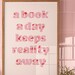 A Book a Day Keeps Reality Away Poster, Bookish Art Print, Pink ...