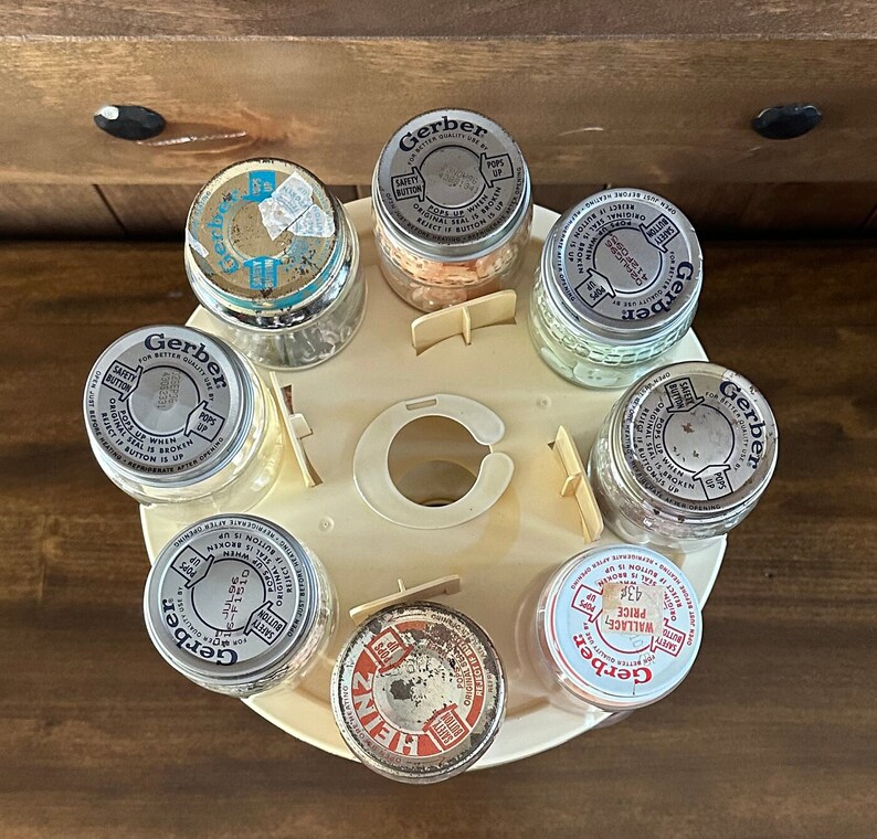 Rare and Cute Vintage Carousel With Vintage Baby Jars Holding Vintage ...