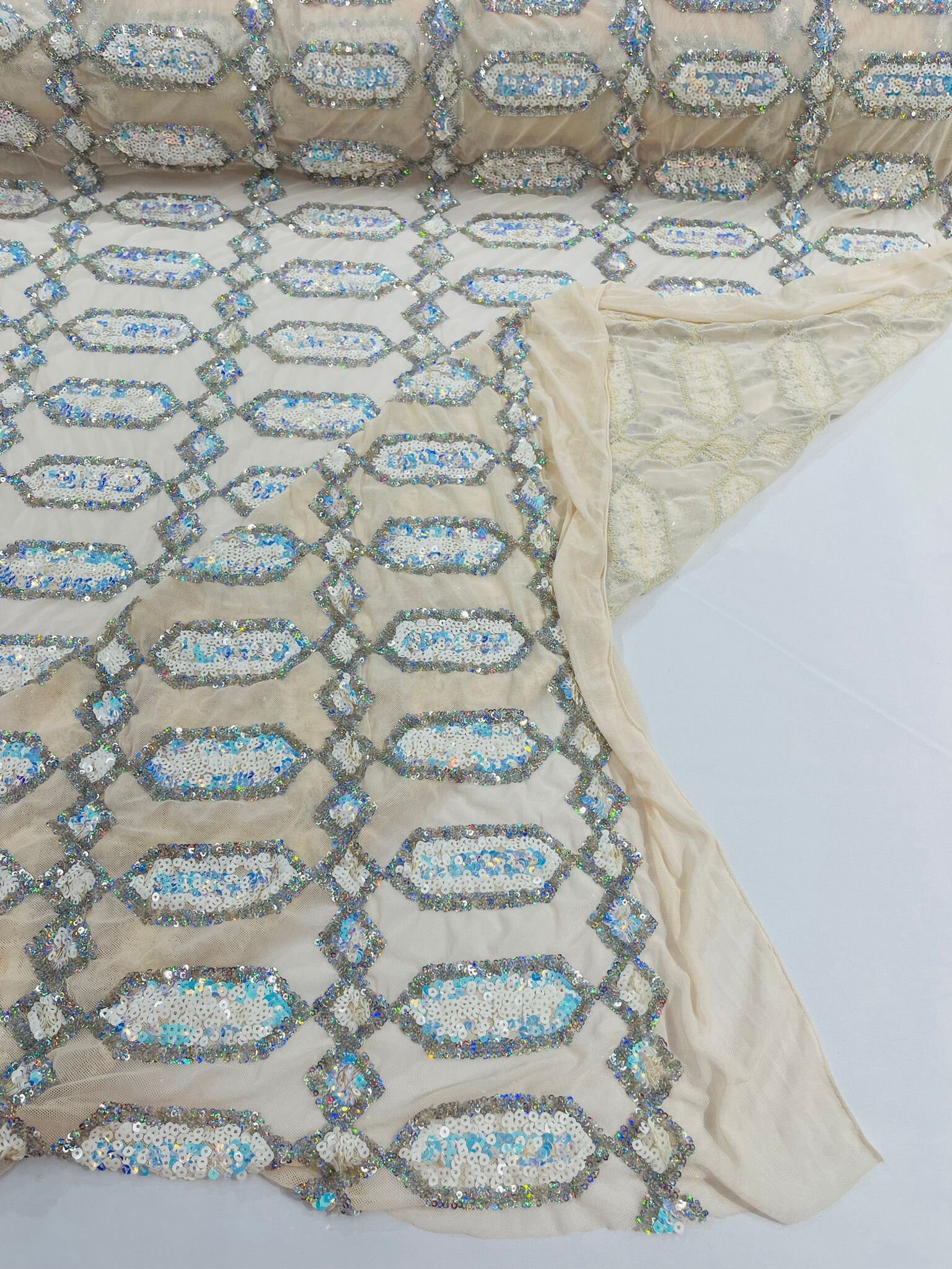 Jewel Sequin Design on a Cream 4 Way Stretch Mesh Fabric. Aqua/silver ...