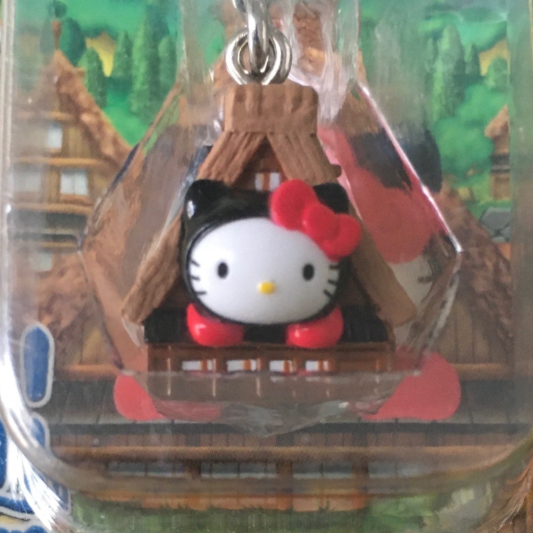 Hello Kitty in a Temple or Tent With Red Accents Phone Zipper Charm ...