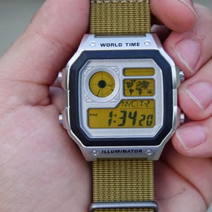 Casio Custom Hydro Mod Royale AE1200 Yellow Arrow 22mm Watch Silver ...