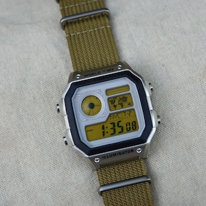 Casio Custom Hydro Mod Royale AE1200 Yellow Arrow 22mm Watch Silver ...