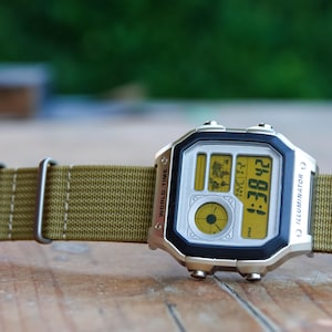 Casio Custom Hydro Mod Royale AE1200 Yellow Arrow 22mm Watch Silver ...