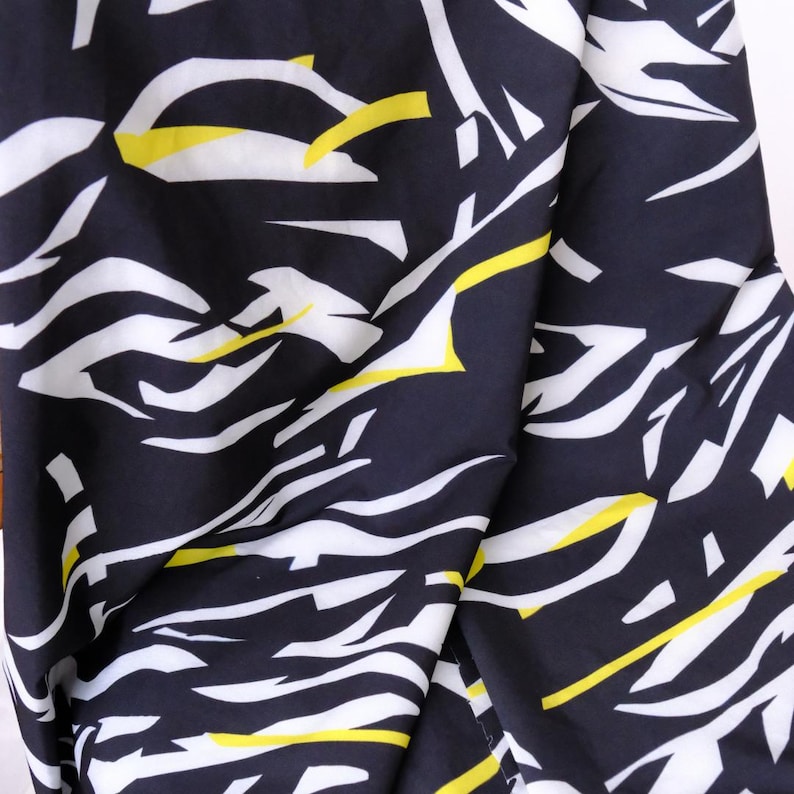 Atlantis Abstract Zebra Print Polyester Fabric, Black White Yellow ...