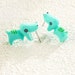 Dino Biting Earlobe Earrings - Etsy