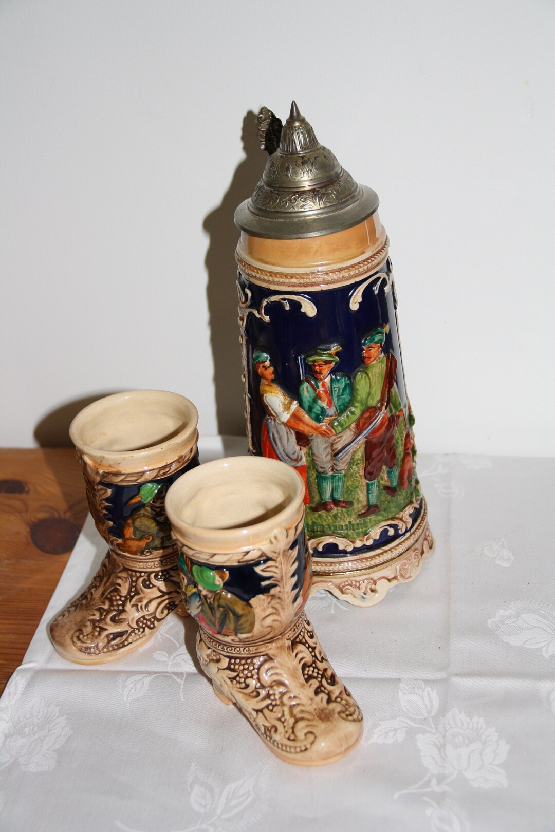 A Musical Tankard With a Pair of Boots as Beer Glasses, a German Style ...