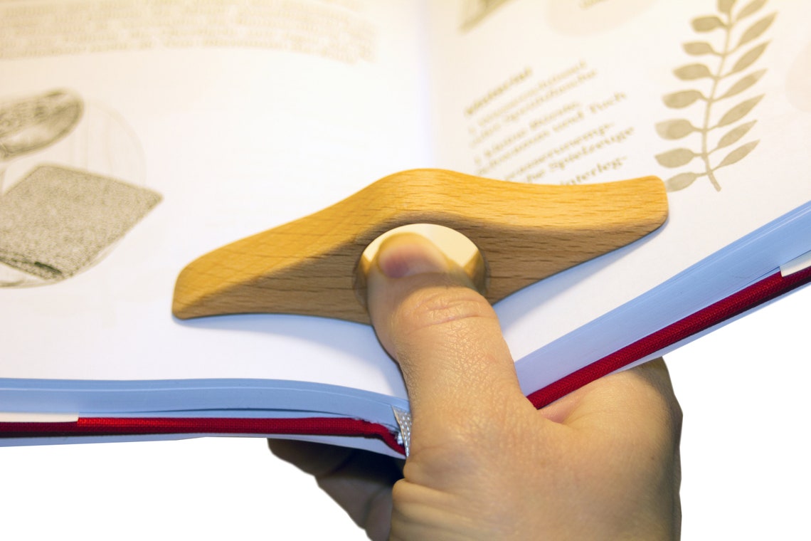 Buch-Seitenhalter aus Holz - Made in Berlin - Thumb Thing Wood ...