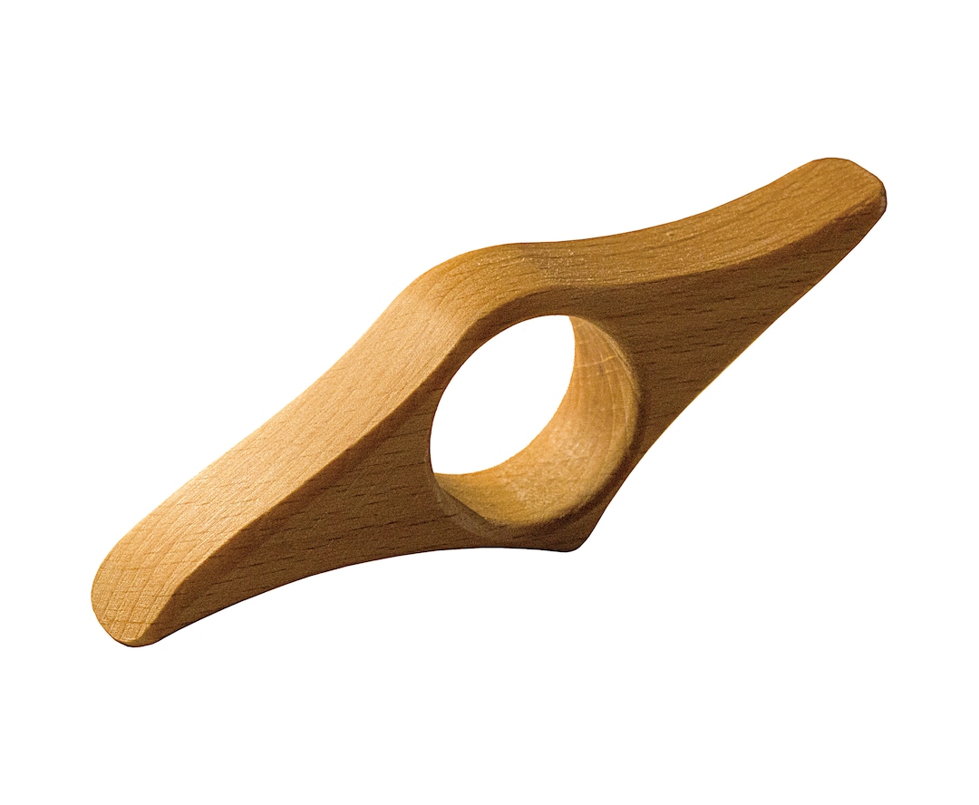 Buch-Seitenhalter aus Holz - Made in Berlin - Thumb Thing Wood ...