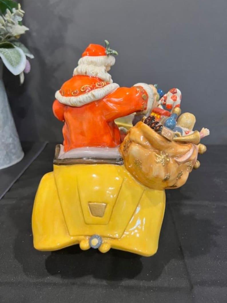 Porcelain Santa on Wheels by Grandeur Noel - Etsy