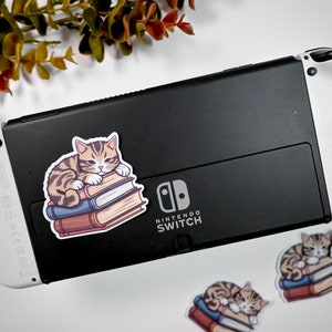 Cat Sleeping on Stack of Books Sticker - Etsy