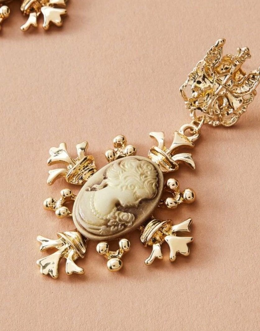 Gold Embossed Figure Drop Earrings - Etsy