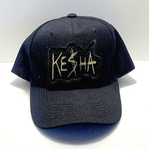 Kesha - Name/logo - Gold & Black Baseball Hat - Adjustable Velcro Back ...