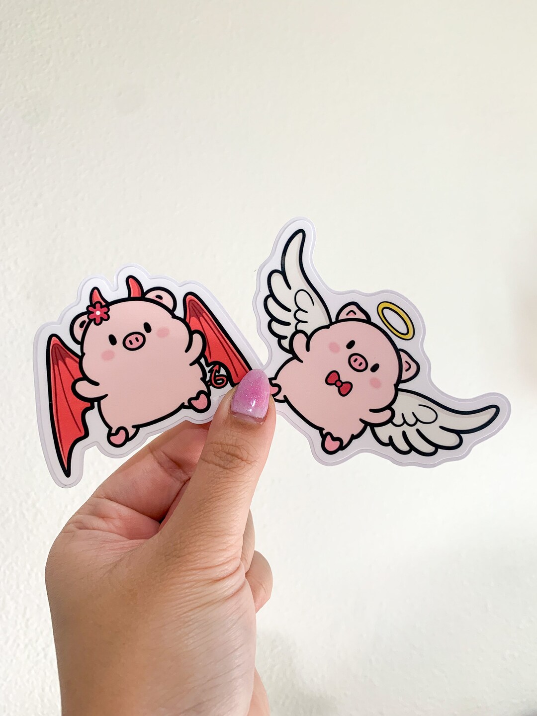 Pinky and Stinky the Pigs - Angel and Devil Sticker | Laminated ...