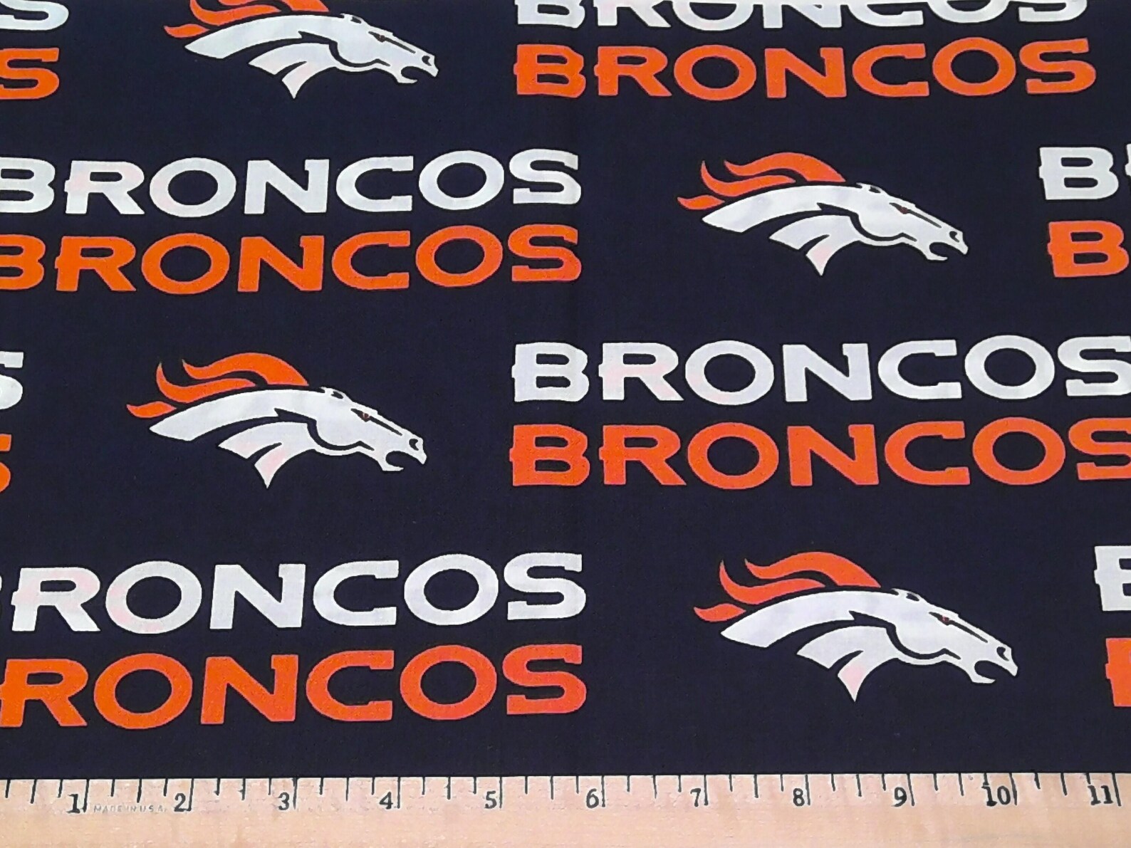 NFL Denver Broncos Football Fabric on Blue 58" Wide 100% Cotton Fabric ...